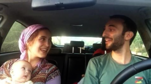 As parents begin singing along in the car, the baby steals their hearts ...